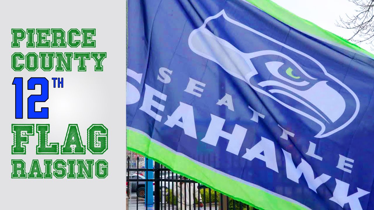 Pierce County employees raise the Seahawks flag - YouTube