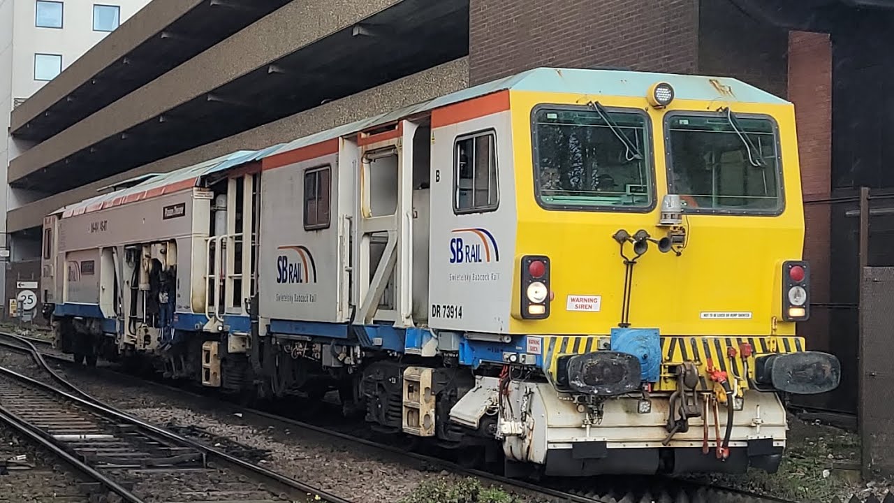 SB RAIL tamper DR 73914 Passing through Lincoln from York to ...
