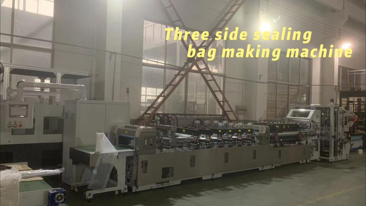 High speed three side sealing bag making machine on sale - YouTube