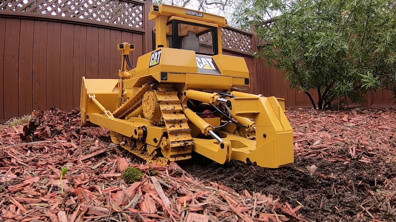 Caterpillar D10 Dozer removing mulch and ripping soil. part 2 - YouTube