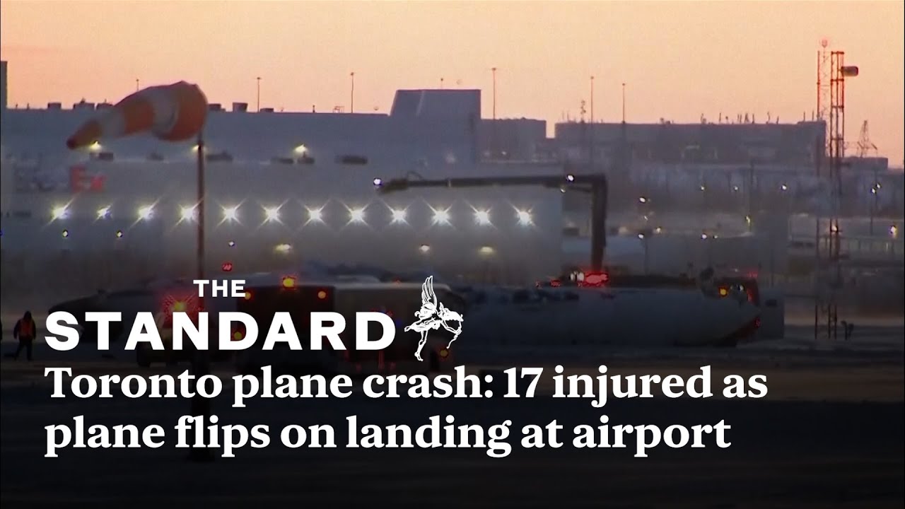 Toronto plane crash: 17 injured as plane flips on landing at airport in ...
