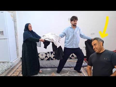 Reza wants to leave home and his mother stops him from leaving.