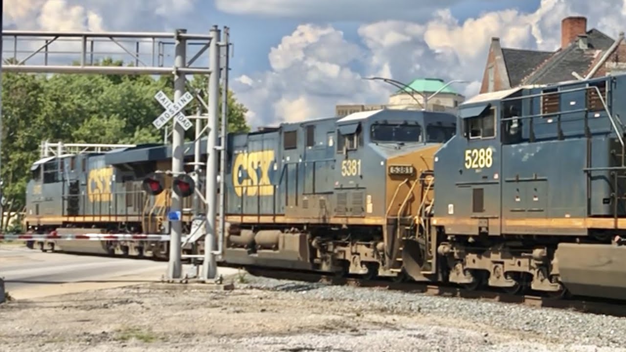 Car Under Crossing Gate, School Bus Has To Wait For Train At Railroad ...