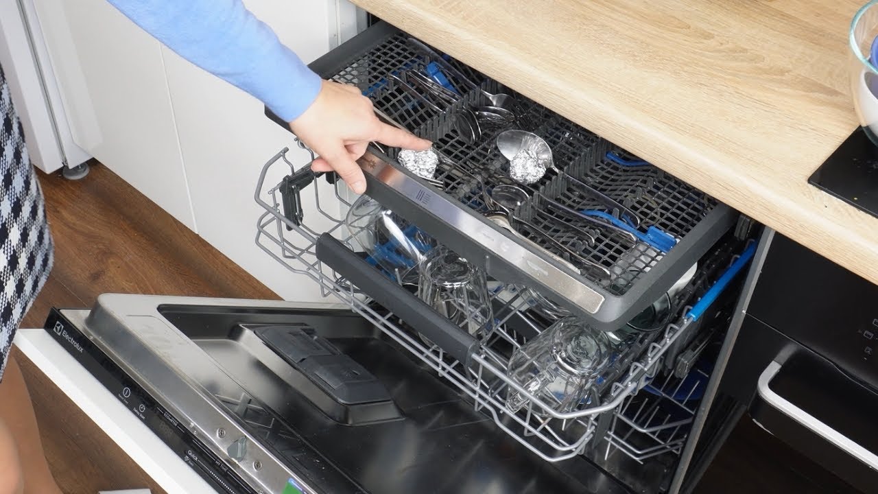 Throw small piece into the dishwasher. Glasses will be shiny - YouTube