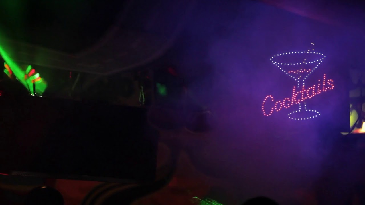 ws flashing lights and retro cocktail sign in nightclub singapore - YouTube