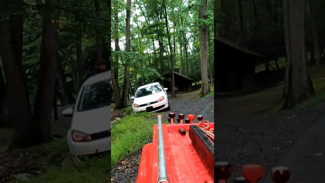 VW high centered off driveway. - YouTube