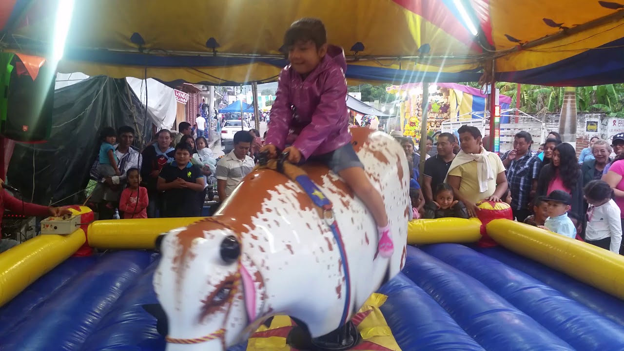 Riding the bull...montando el torito - YouTube