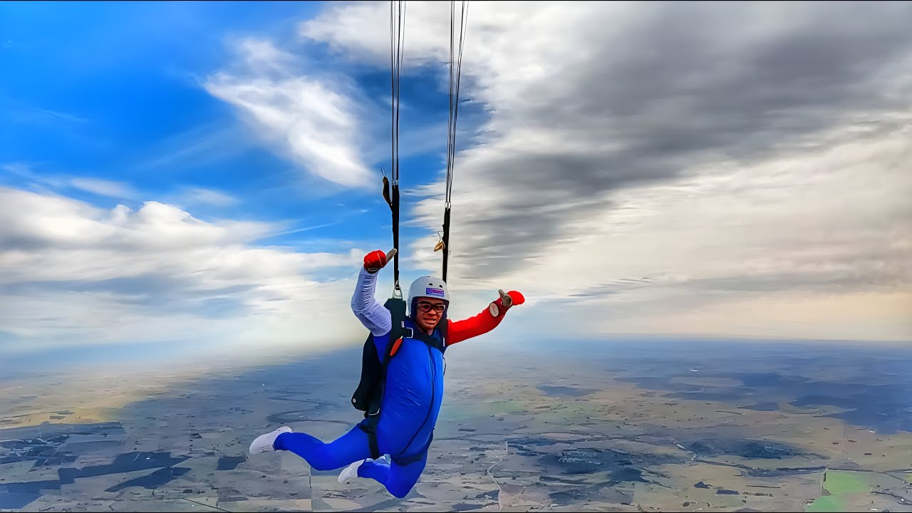 Skydiving on a cloudy Sunday from 10.000 feet out of a Cessna 182 - YouTube