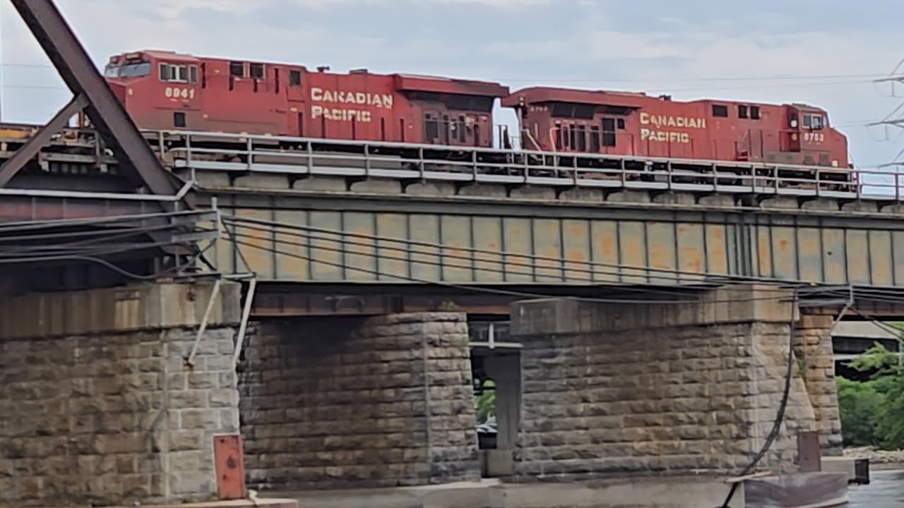 TRAINS CPKC Double Stack Crosses Sainte Anne De Bellevue Bridge - YouTube