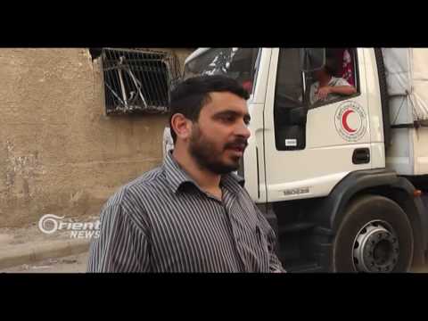 دخول مساعدات إنسانية جديدة إلى مدينة حرستا بريف دمشق