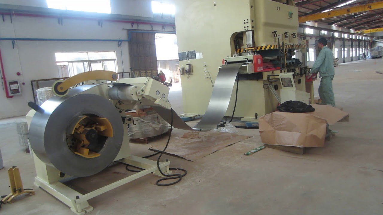 wire uncoiler machine - YouTube