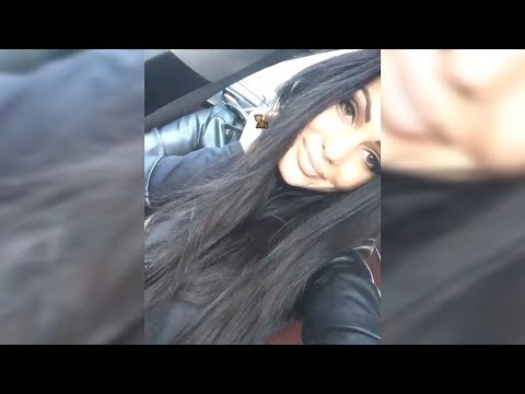 Hot teen in black leather jacket play with her beautiful long hair