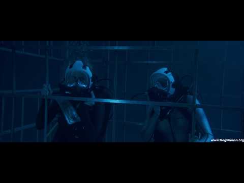 2 female divers with FFMs, a shark cage, and bad guys - Part 1