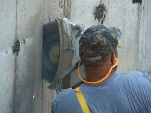 Cutting concrete walls down - YouTube