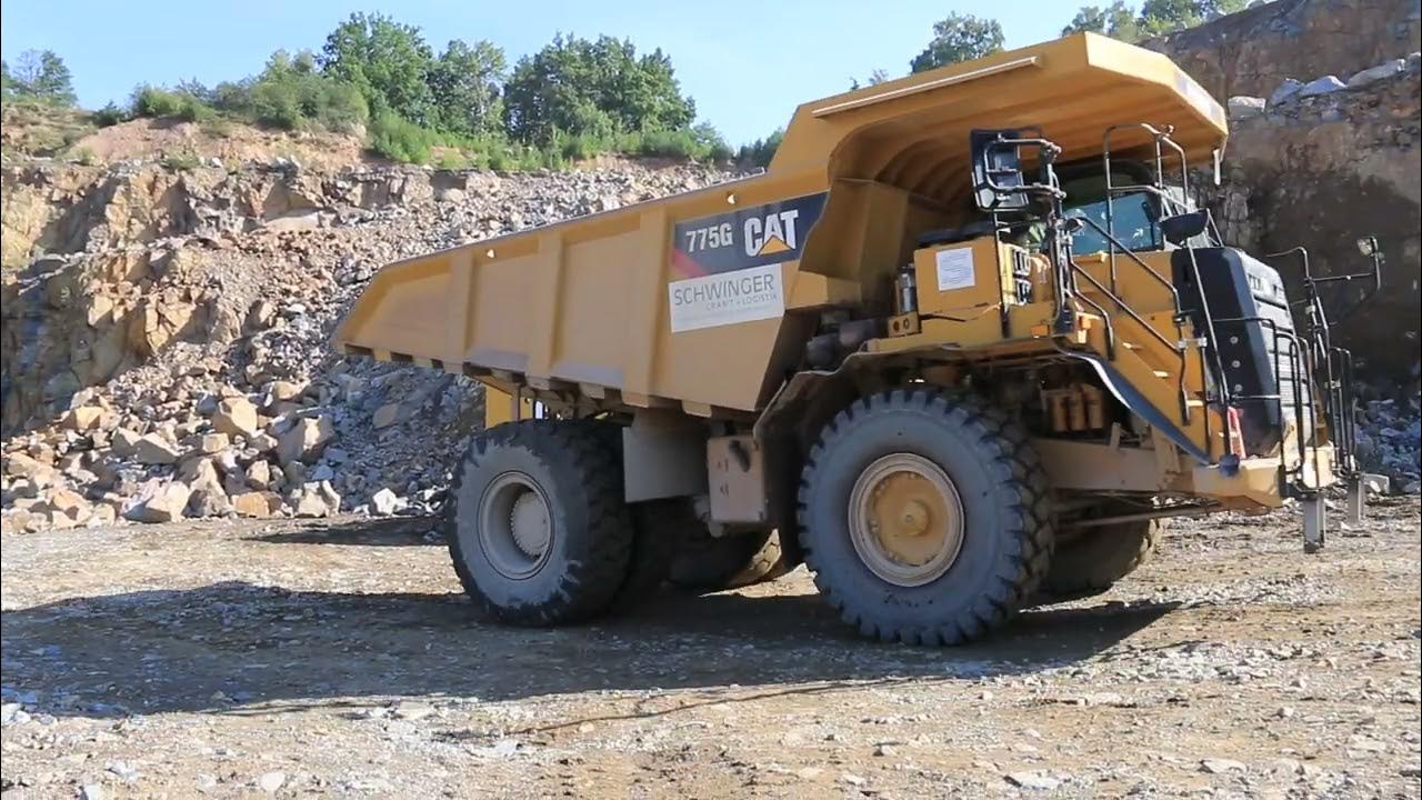 Cat 385 C loading Cat 775G - YouTube