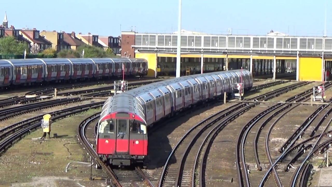 London Underground 1973 Stock 863 and 116 departing Northfields Depot ...