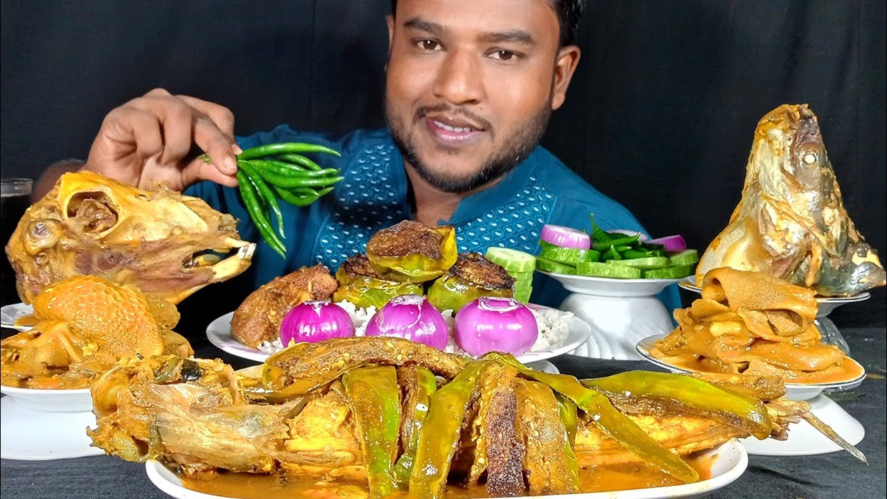 Spicy mutton boti curry , full goat head curry, spicy full fish curry ...