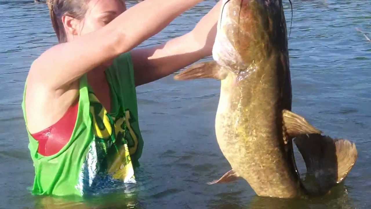 Ashley's First Catfish Noodling - YouTube