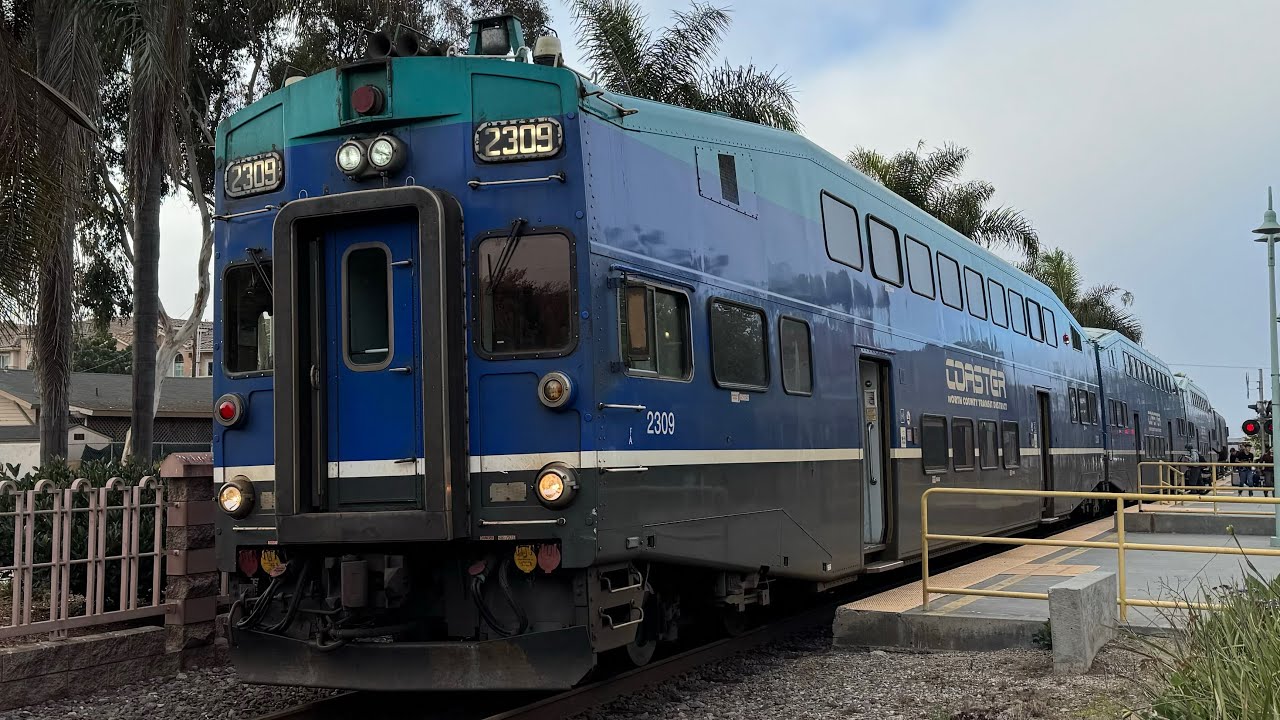 Coaster cab car 2309 passing through Carlsbad Village station with some ...