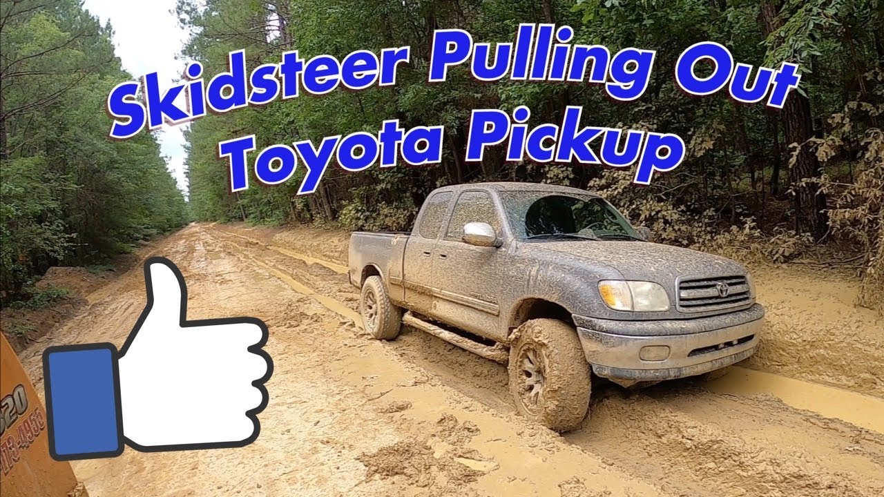 Skidsteer Pulling Out Toyota Pickup - YouTube