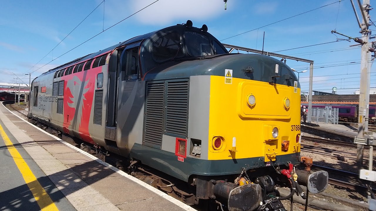 0N38 GOG class 37 884 Cepheus departing from Crewe platform 12 light ...