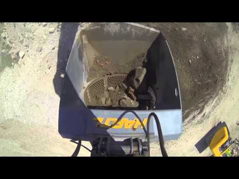 Screening construction waste with soil - YouTube