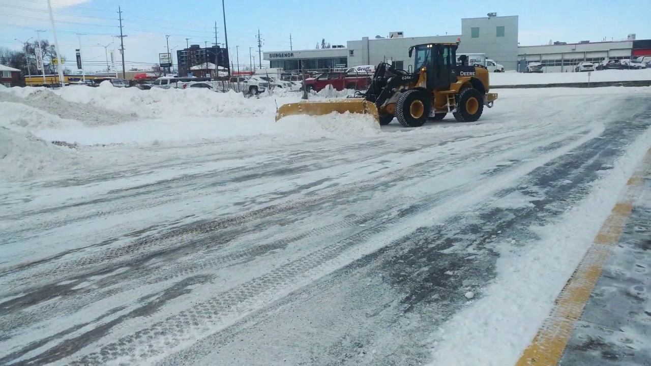 John Deere 624K Loader With Metal Pless Snow Plow Full Power Into A ...