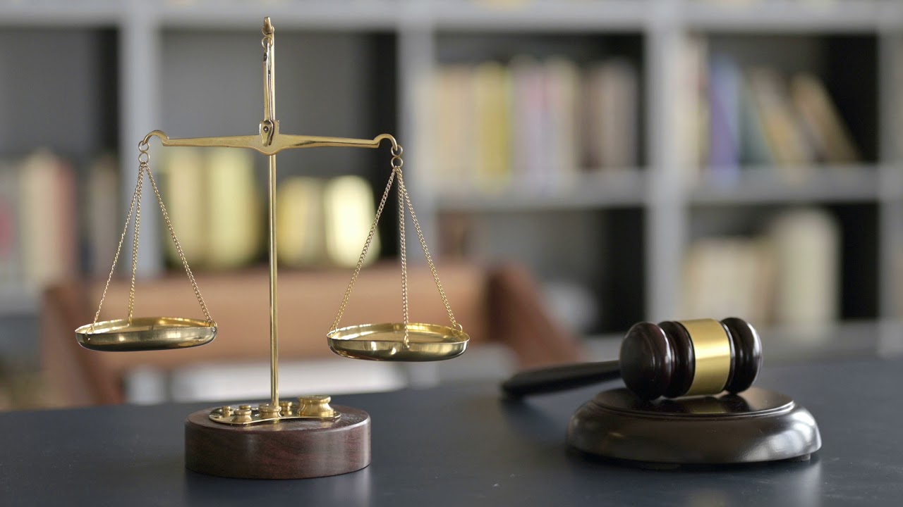 gavel and gold brass balance scale on lawyer offic CZQAENC - YouTube