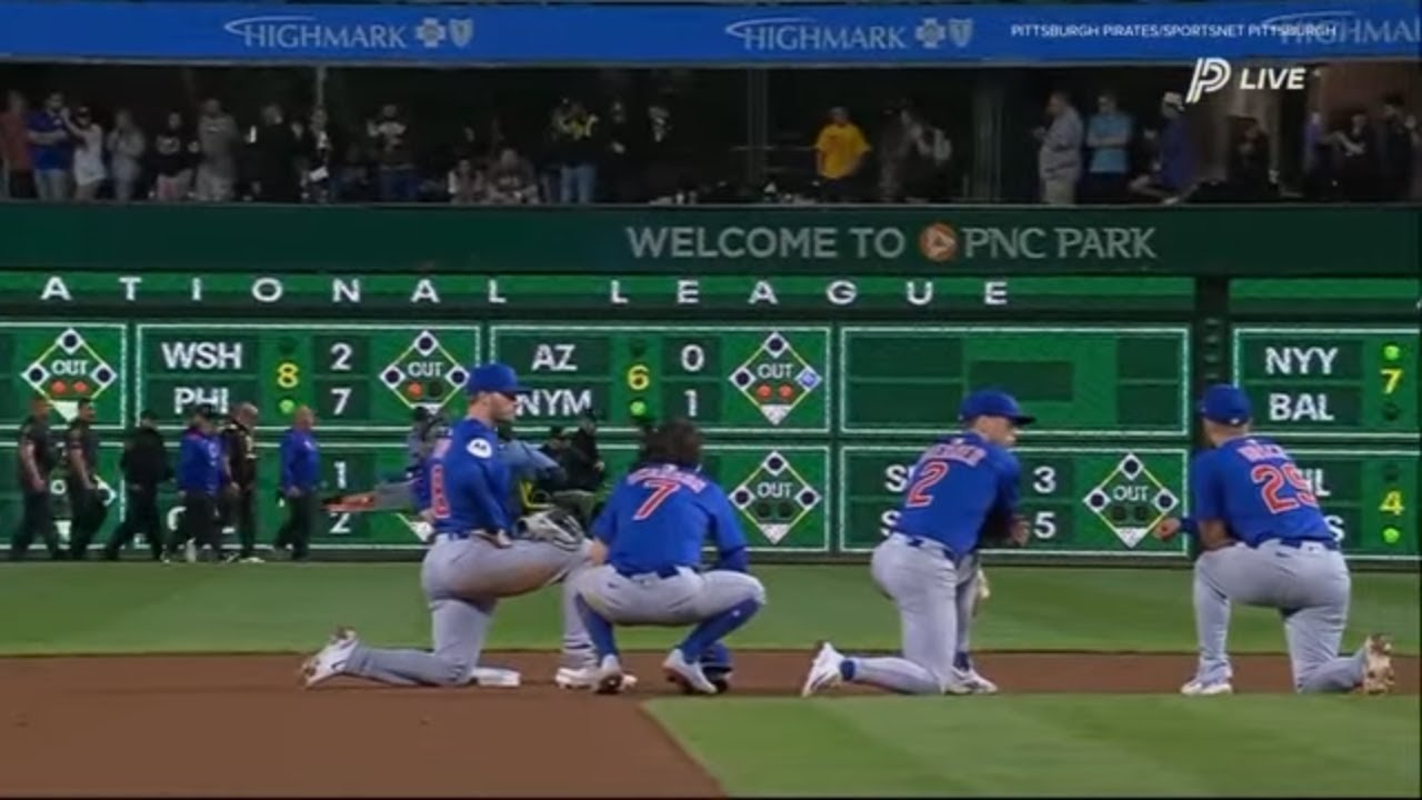 Fan falls over 20 feet from stands onto field during Cubs vs. Pirates ...