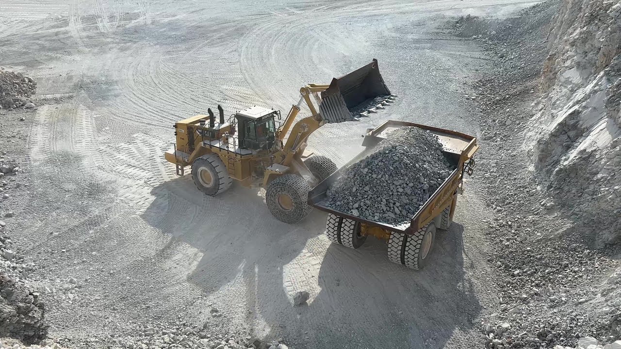 Caterpillar 992K Wheel Loader Loading Caterpillar 777F Dumpers ...