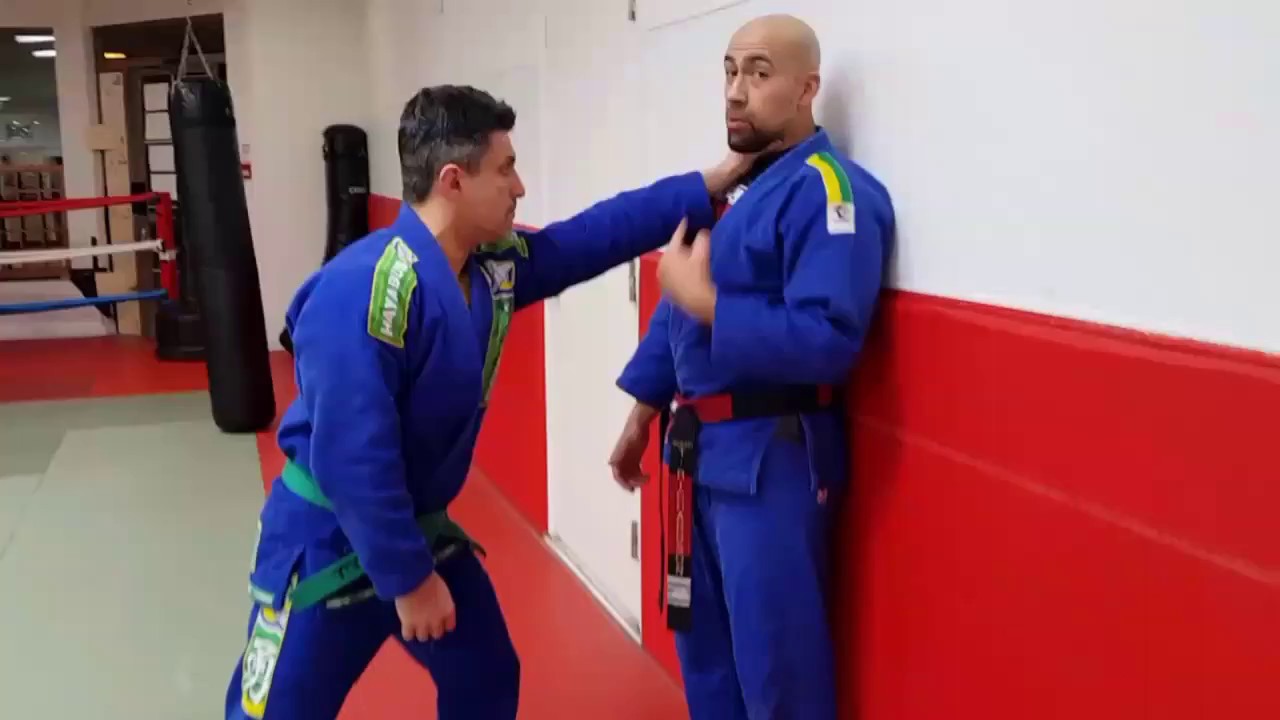 Simple Choke and Hold Defense - YouTube