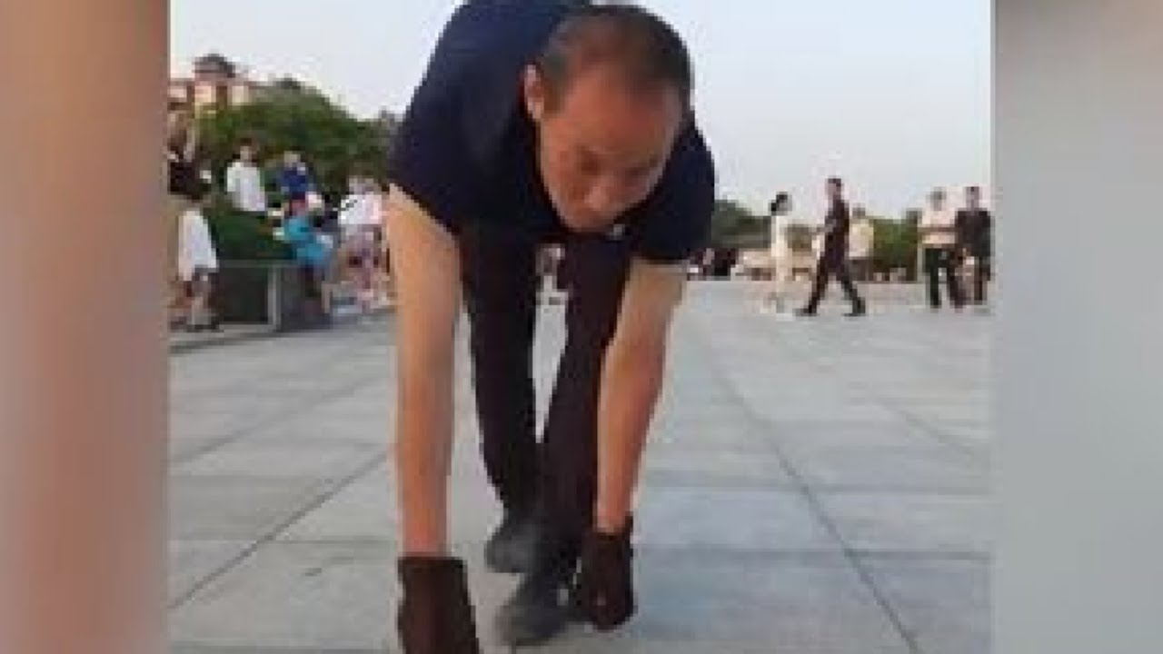 Chinese man walks like a monkey for exercise and to prevent illness ...