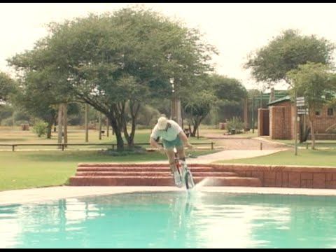 Swimming pool Stunts - Bicycle jumps into swimming pool - YouTube
