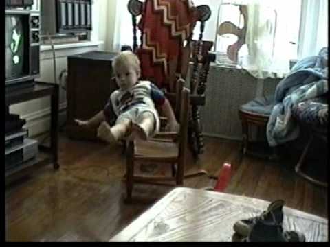 kid falls off chair - YouTube