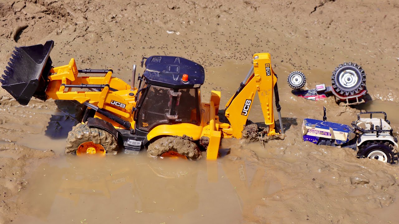 Tractor Stuck in Mud due to accident from Bridge pulling by JCB Backhoe ...