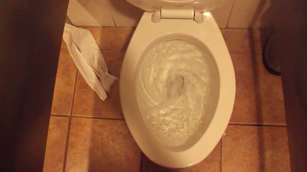 Partially clogged Mid 1980's American Standard Madera Toilet - YouTube