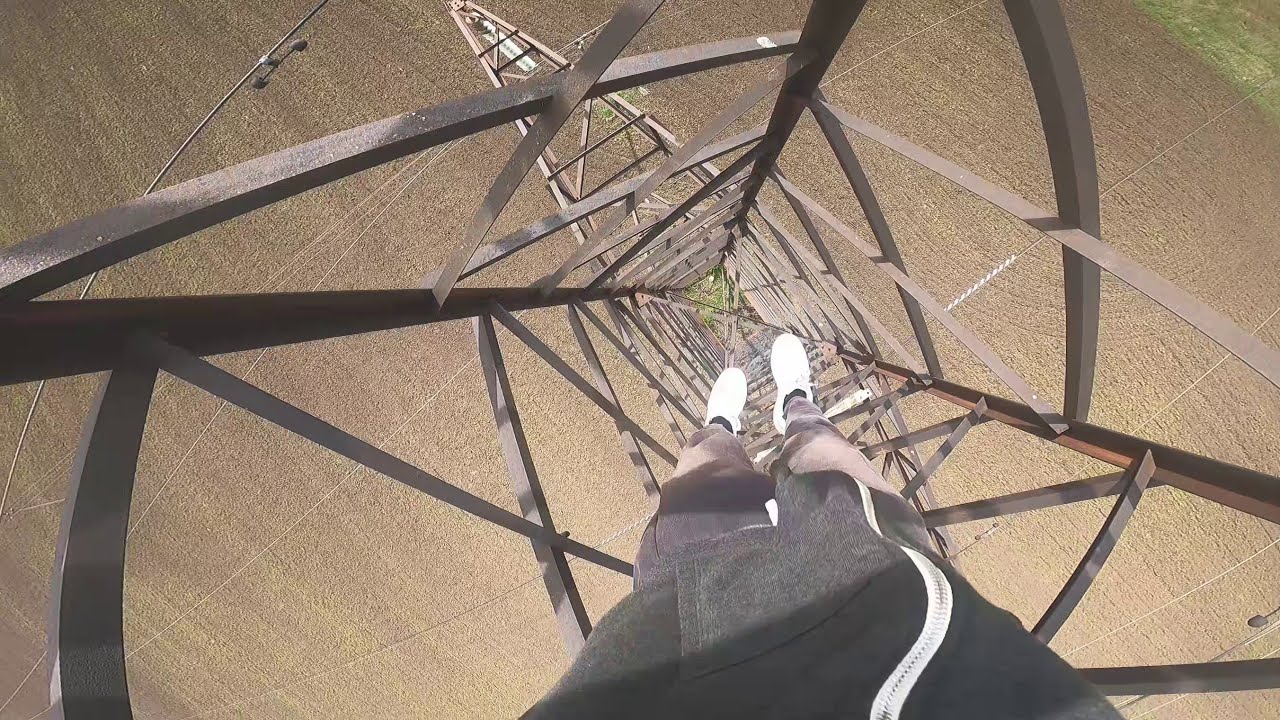 Hanging on top of 220 kV pylon - YouTube