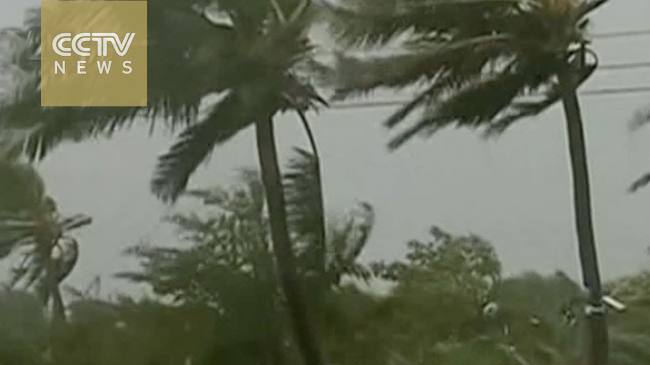Typhoon Aere lingers in South China Sea - YouTube