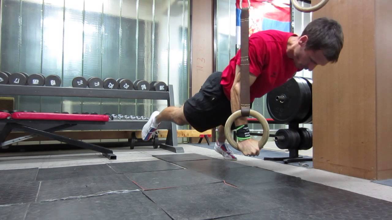 Ring strength 1 arm 1 leg push up on a gymnastic ring - YouTube