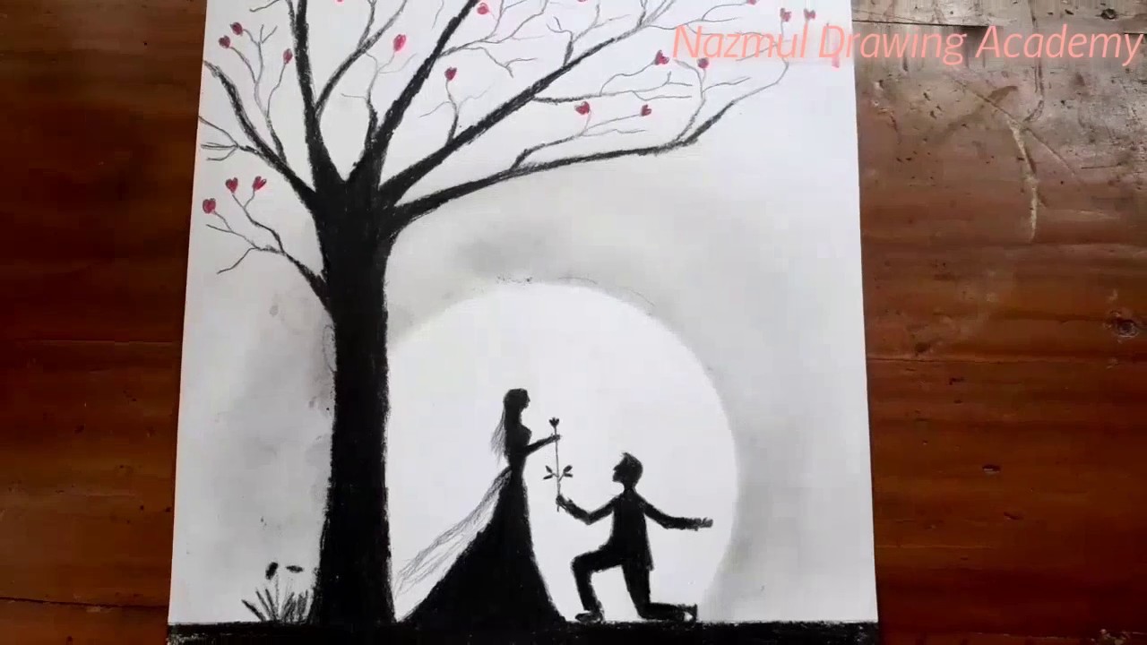 How romantic couple is standing under the tree dedicating love ...