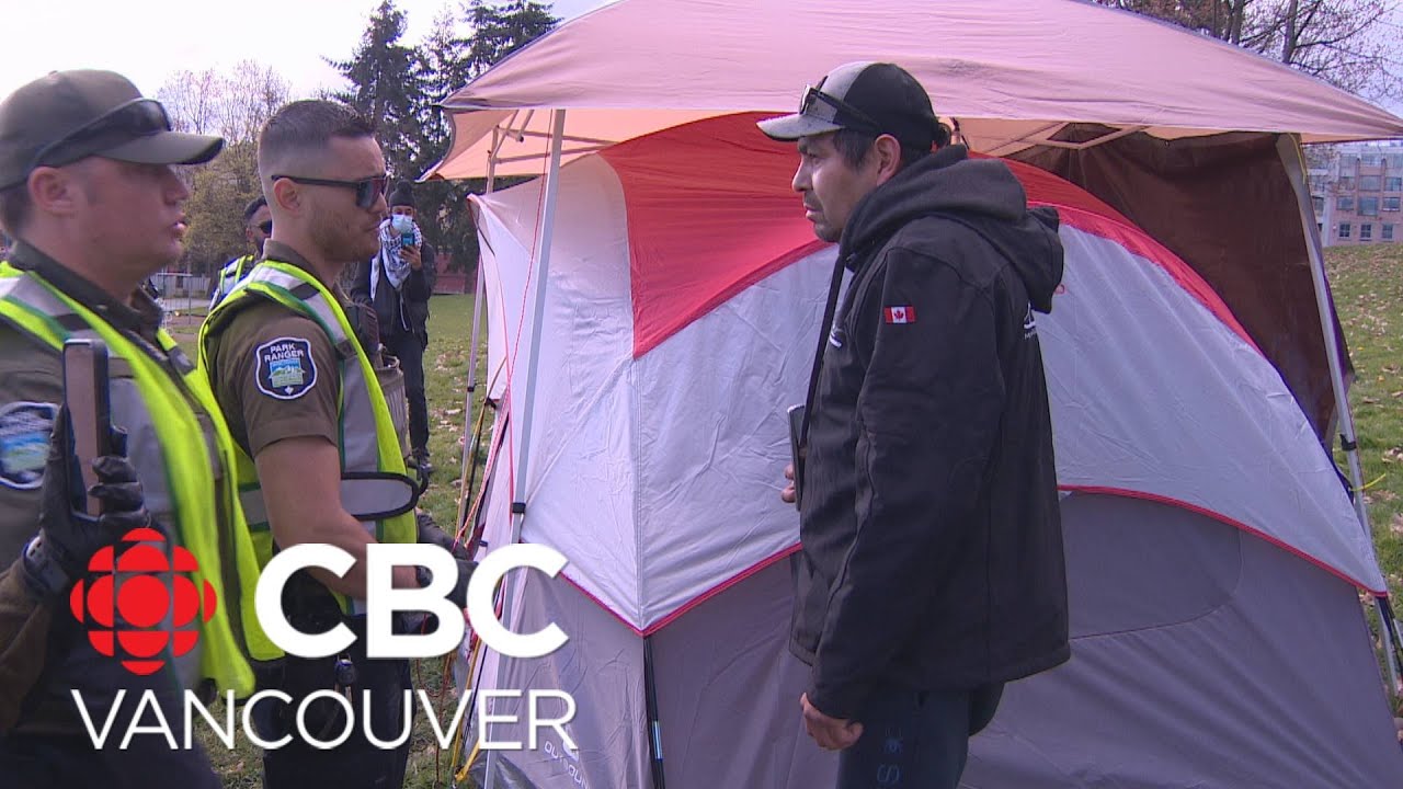 Park rangers remove tents in Vancouver's CRAB Park - YouTube