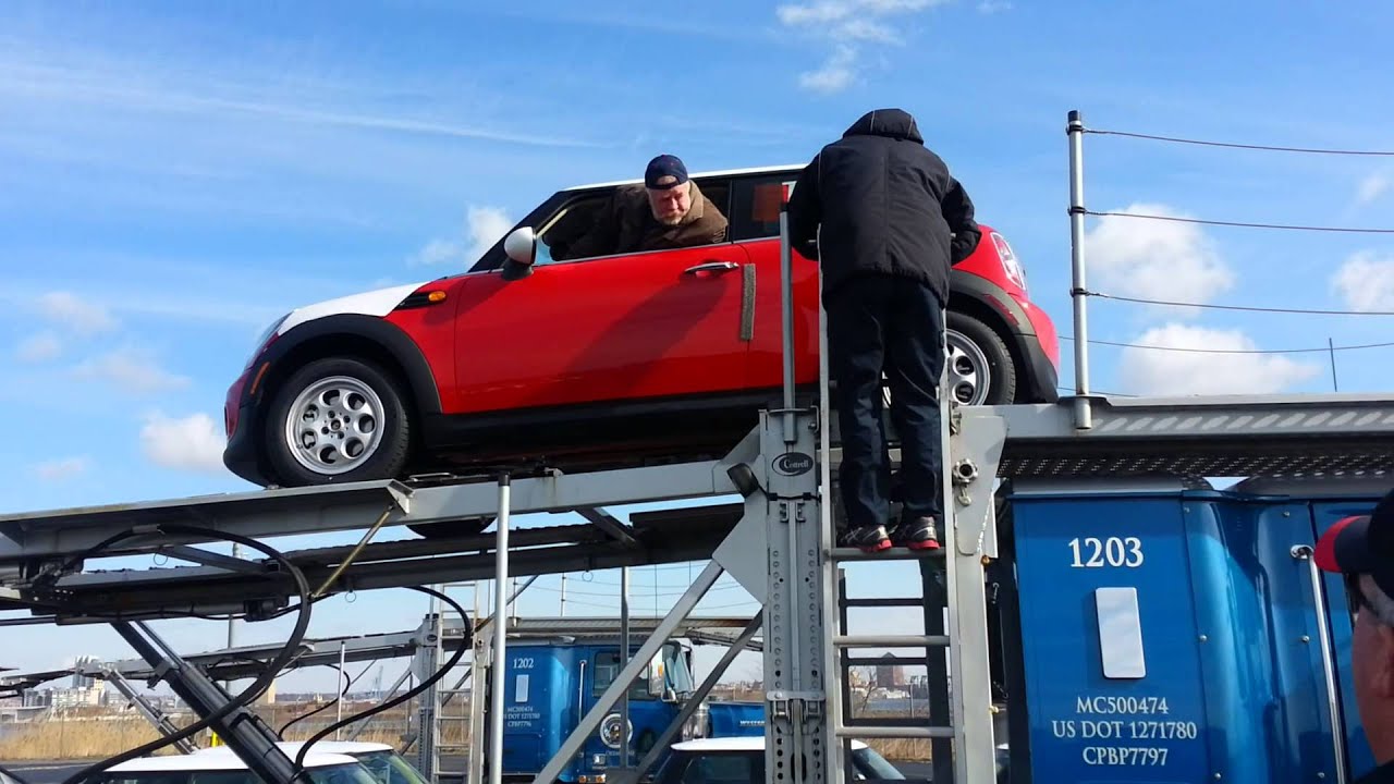 Car hauler loading car number 1 - YouTube