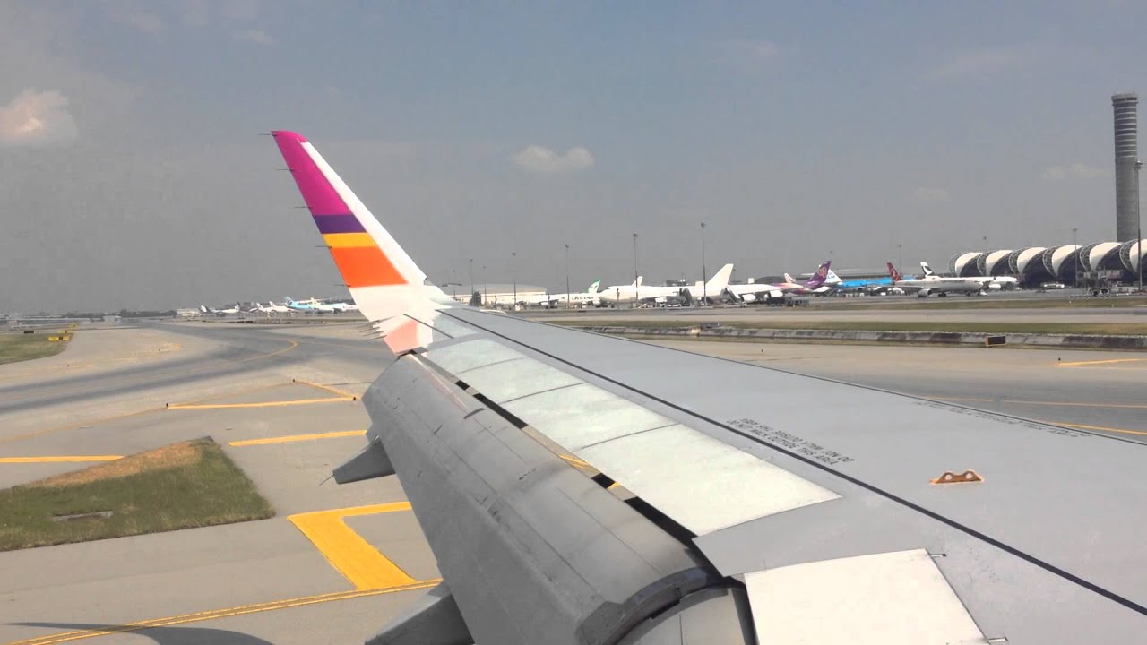 LATE FLAPS,GEAR AND REVERSE LANDING? Thai smile A320 Sharklets landing ...