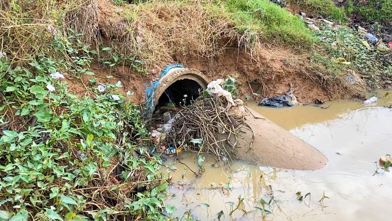 Biggest Culvert , Unclogging Clogs Culvert Drain After Wind And ...