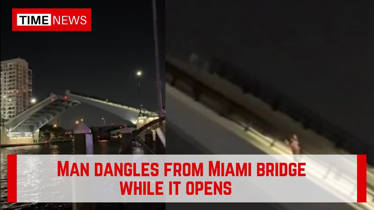 Man dangles from Miami bridge while it opens | TIME NEWS - YouTube