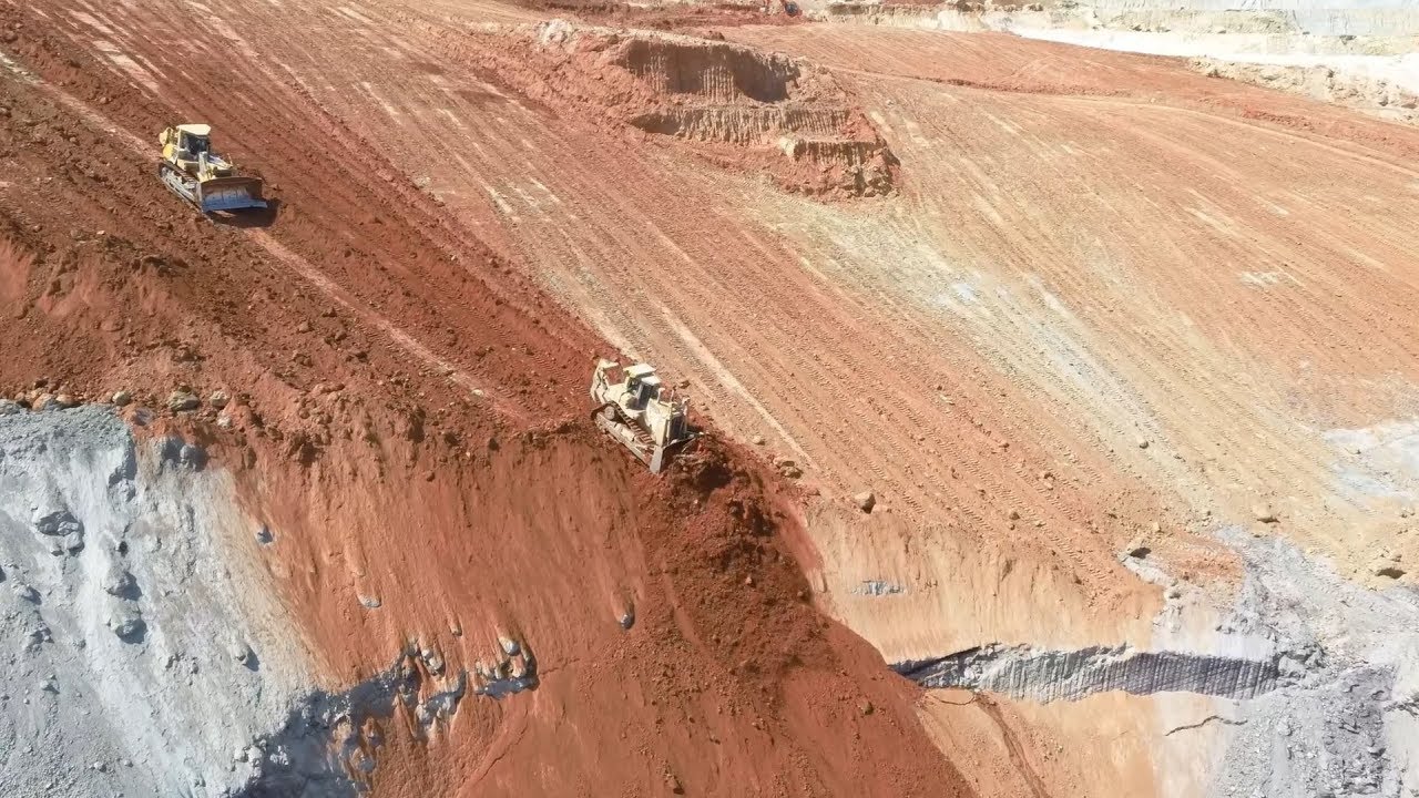 Three Bulldozers Caterpillar D9R And Komatsu D275 Pushing Soil - YouTube
