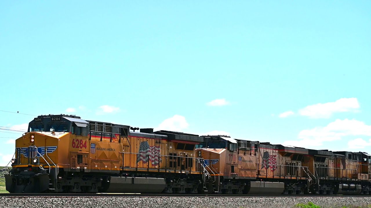 Union Pacific Trains - Mixed manifest train, westbound passing MP 411. ...