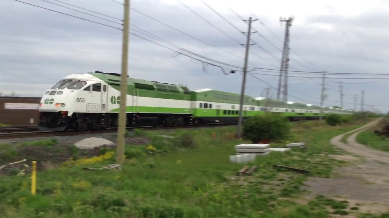 WB GO cab car 307 & MPI MP40PH-3C 665 4th line grade crossing May 19 ...