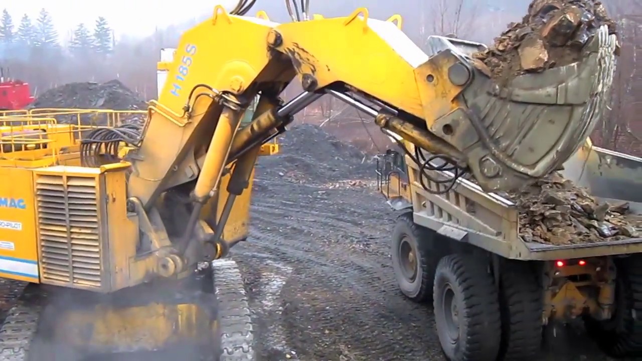Demag H185S Loading Caterpillar 785B's - YouTube