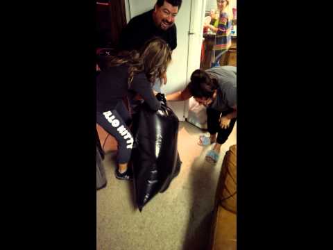 Girl in trash bag